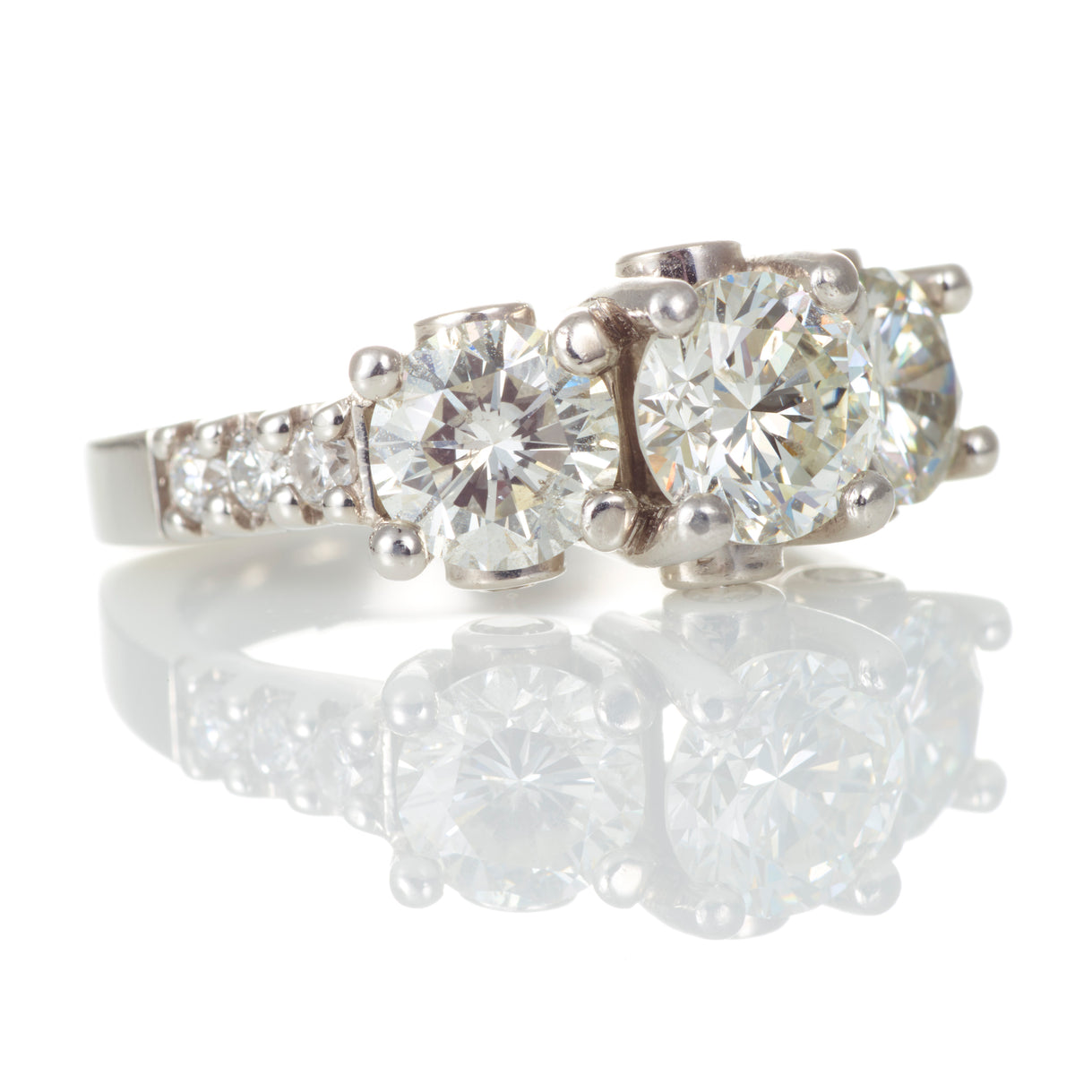 Buy Platinum Three Stone Round Diamond Ring for Bridal Online